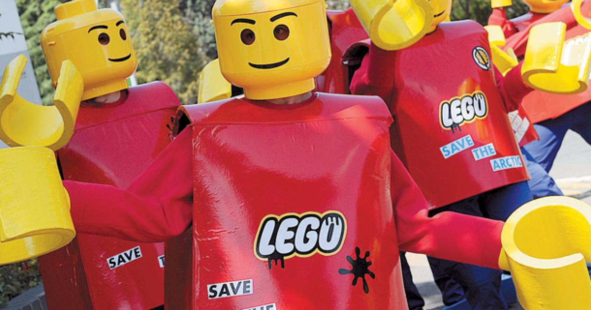 Greenpeace campaigners march through Slough in Lego protest ...