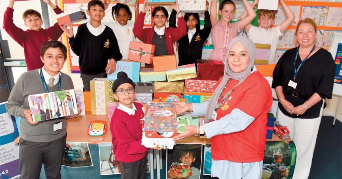 Slough school pupils present donation shoe boxes to Slough Refugee ...