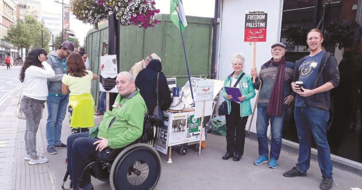 Demonstrators protest against HSBC arms investments outside Slough ...