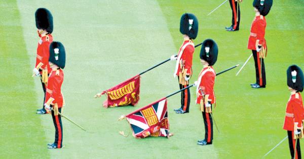 IN PICTURES: The Queen presents new colours to the Welsh Guards at ...