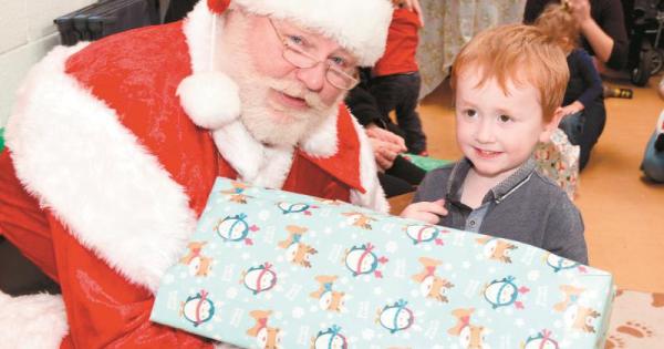 Charity holds annual Christmas party for families at Larchfield ...
