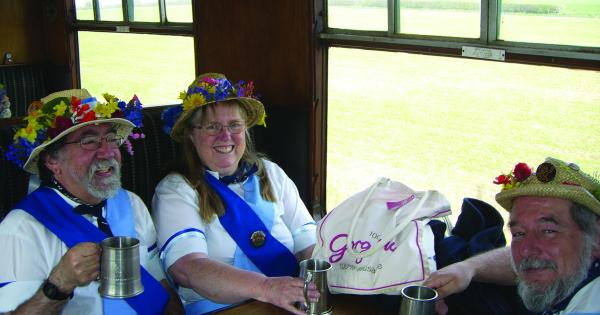 Folk dancers pay homage with music and dancing at group member's ...