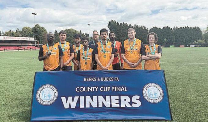 Slough Town team lifts the Berks & Bucks Inclusive Cup at Beaconsfield ...