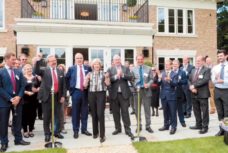 Theresa May opens Woolley Hall housing development - Maidenhead Advertiser
