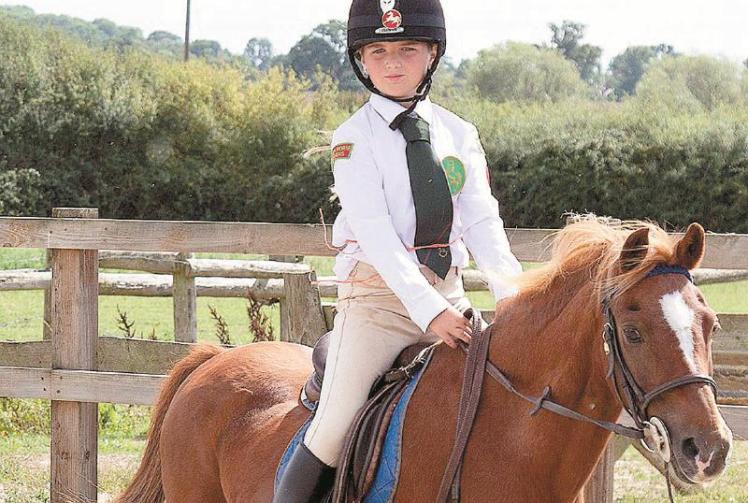 Young horse rider fundraises to repair 'beloved' horse ranger charity ...